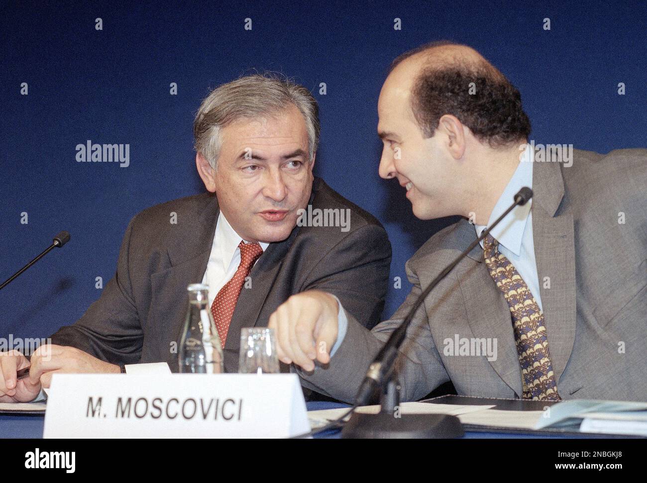 French Finance Minister Dominique Strauss-Kahn, left, and French ...