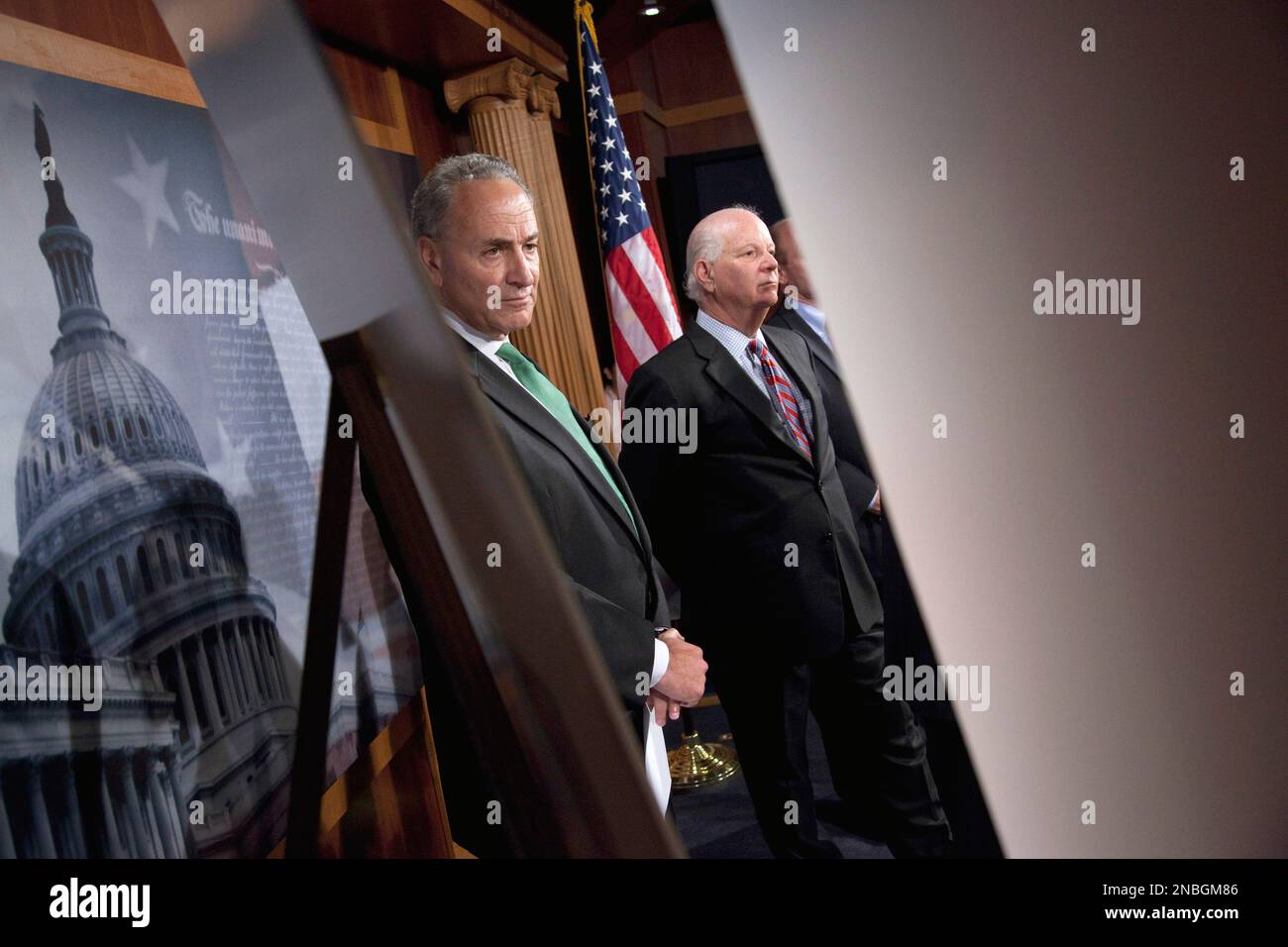 Sen. Charles Schumer, D-N.Y., left, and Sen. Ben Cardin, D-Md., take ...