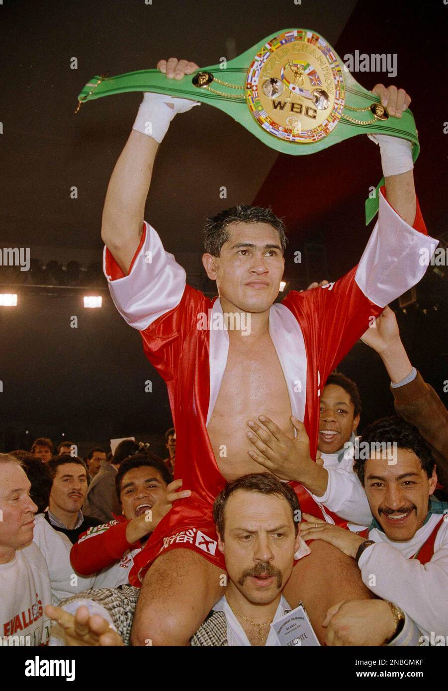 Jose Luis Ramirez of Mexico sits on the shoulders of his supporters and ...