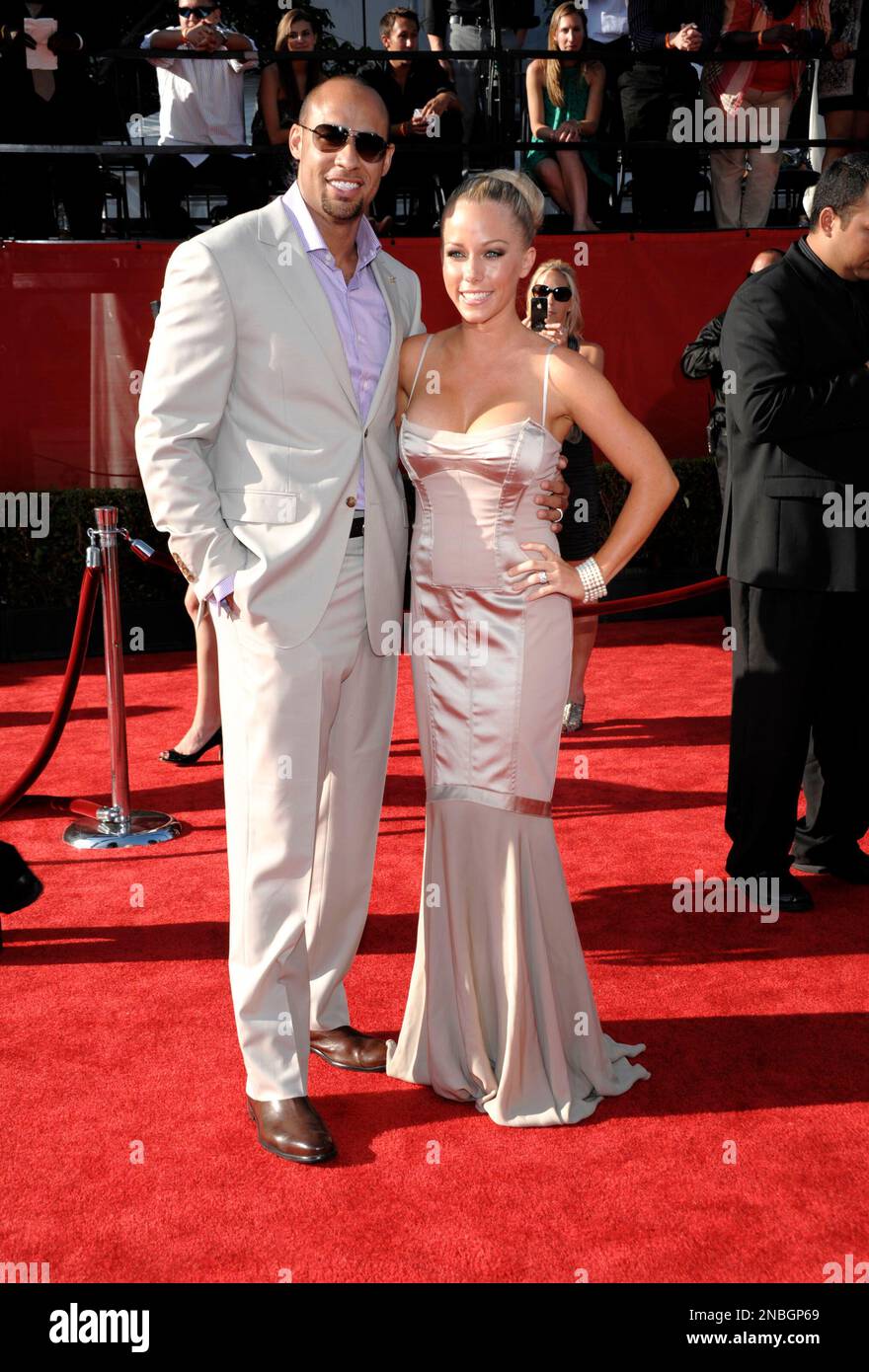 Hank Baskett, left, and Kendra Wilkinson arrive at the ESPY awards on ...