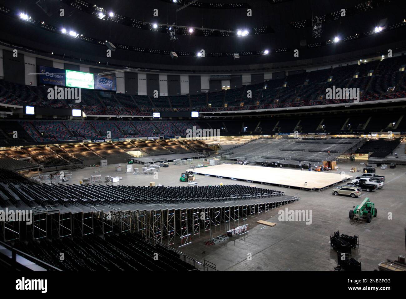 Staff members install temporary seating in the newly renovated ...
