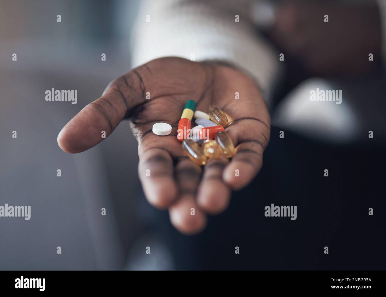 All my vitamins are accounted for. an unrecognizable man sitting alone ...