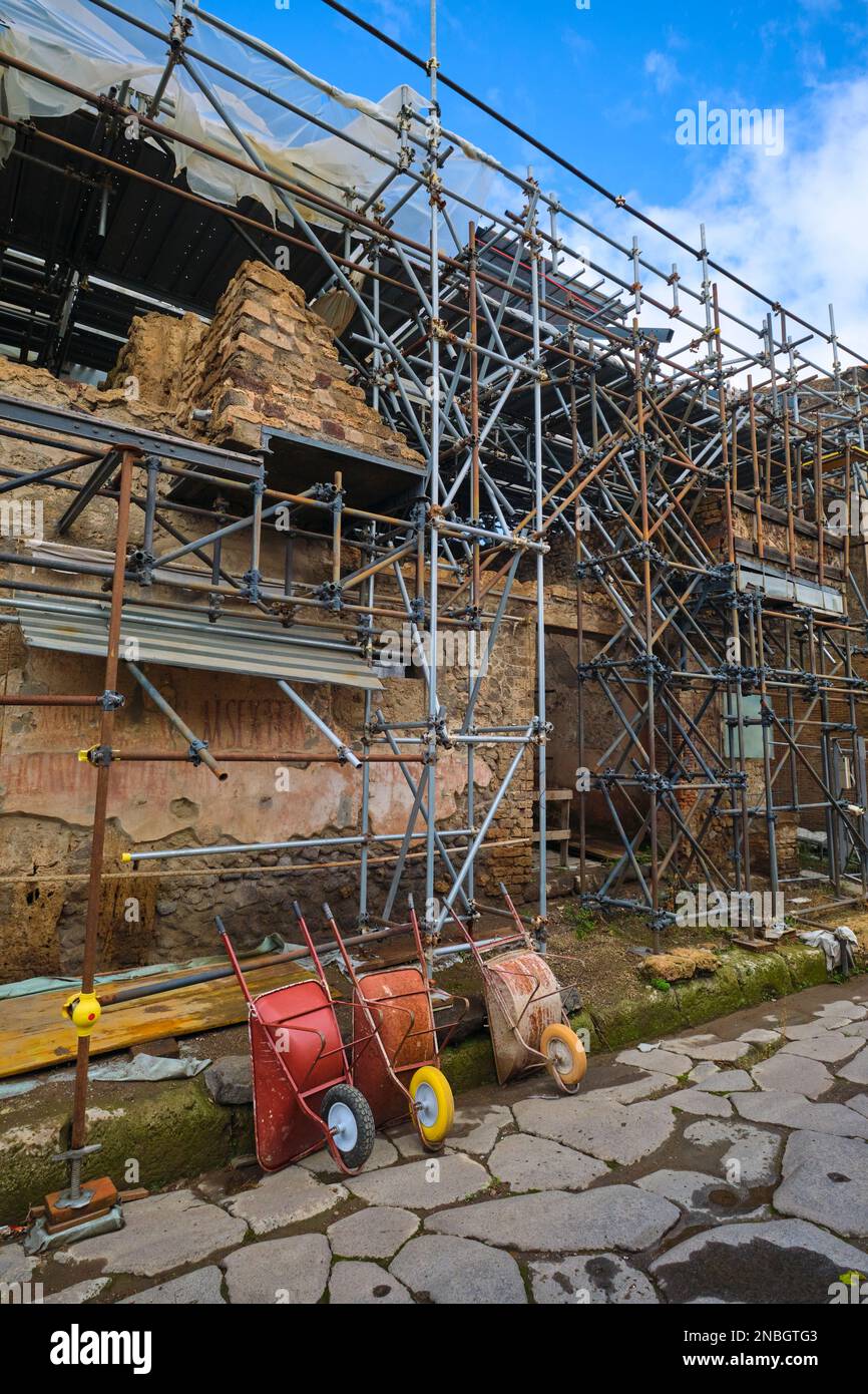Preservation, restoration work with metal scaffolding being done at a ...
