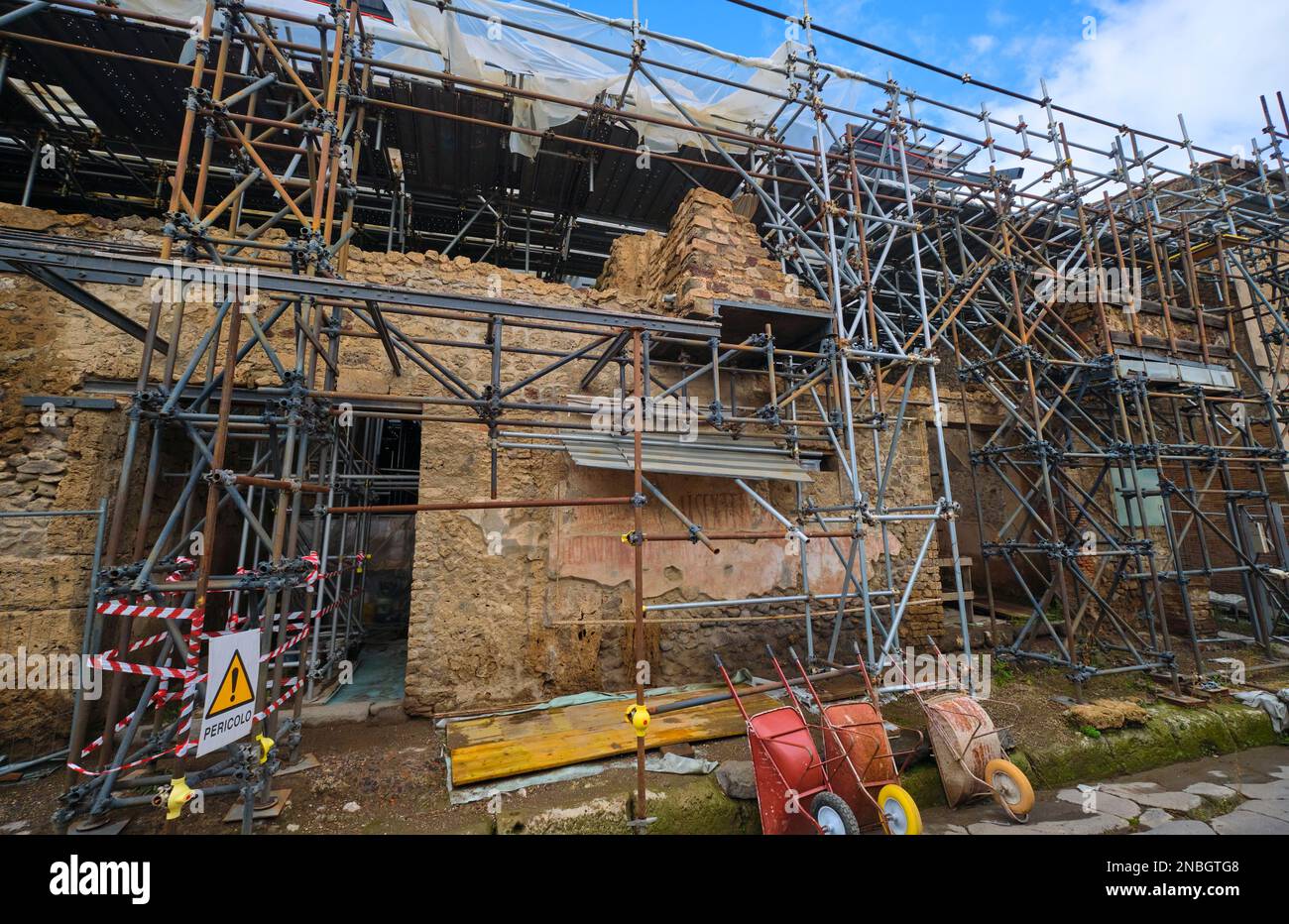 Preservation, restoration work with metal scaffolding being done at a ...