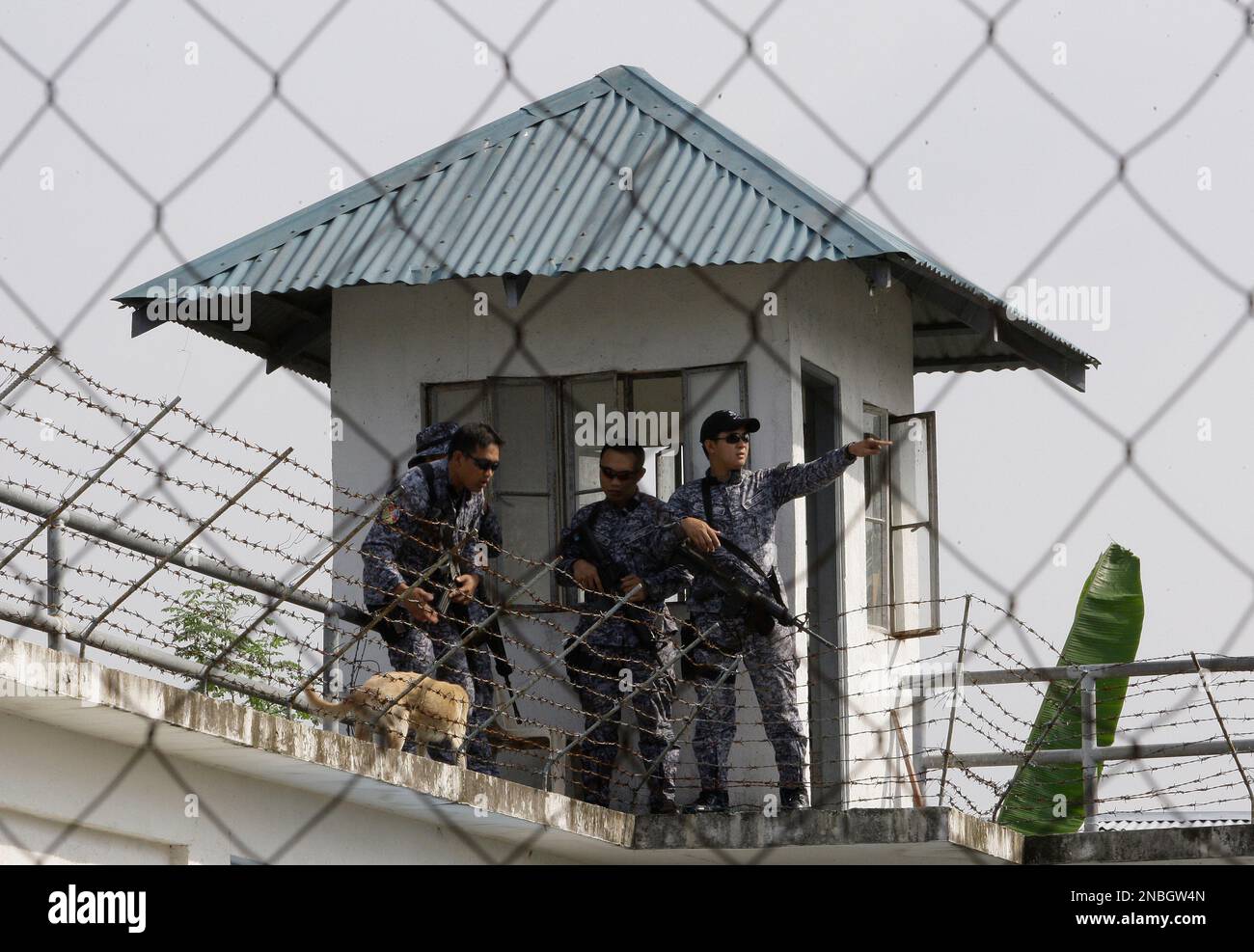 Bureau of Jail Management and Penology security officers stand at a ...