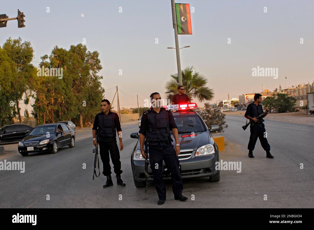 Libyan special emergency police officers patrol the streets in the ...