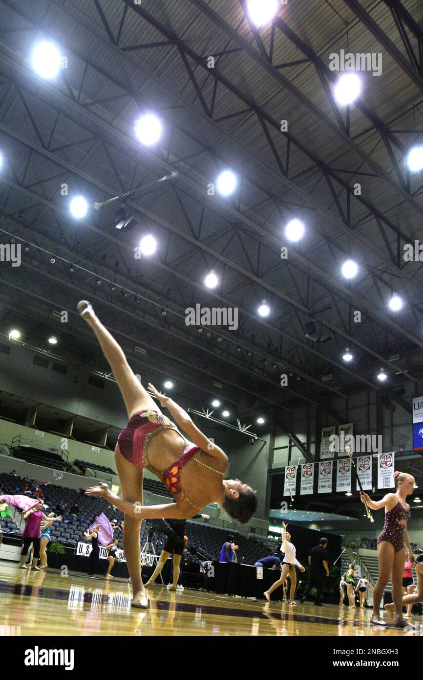 Jennifer Marcus, left, of Orlando, Fla., and others practice before ...