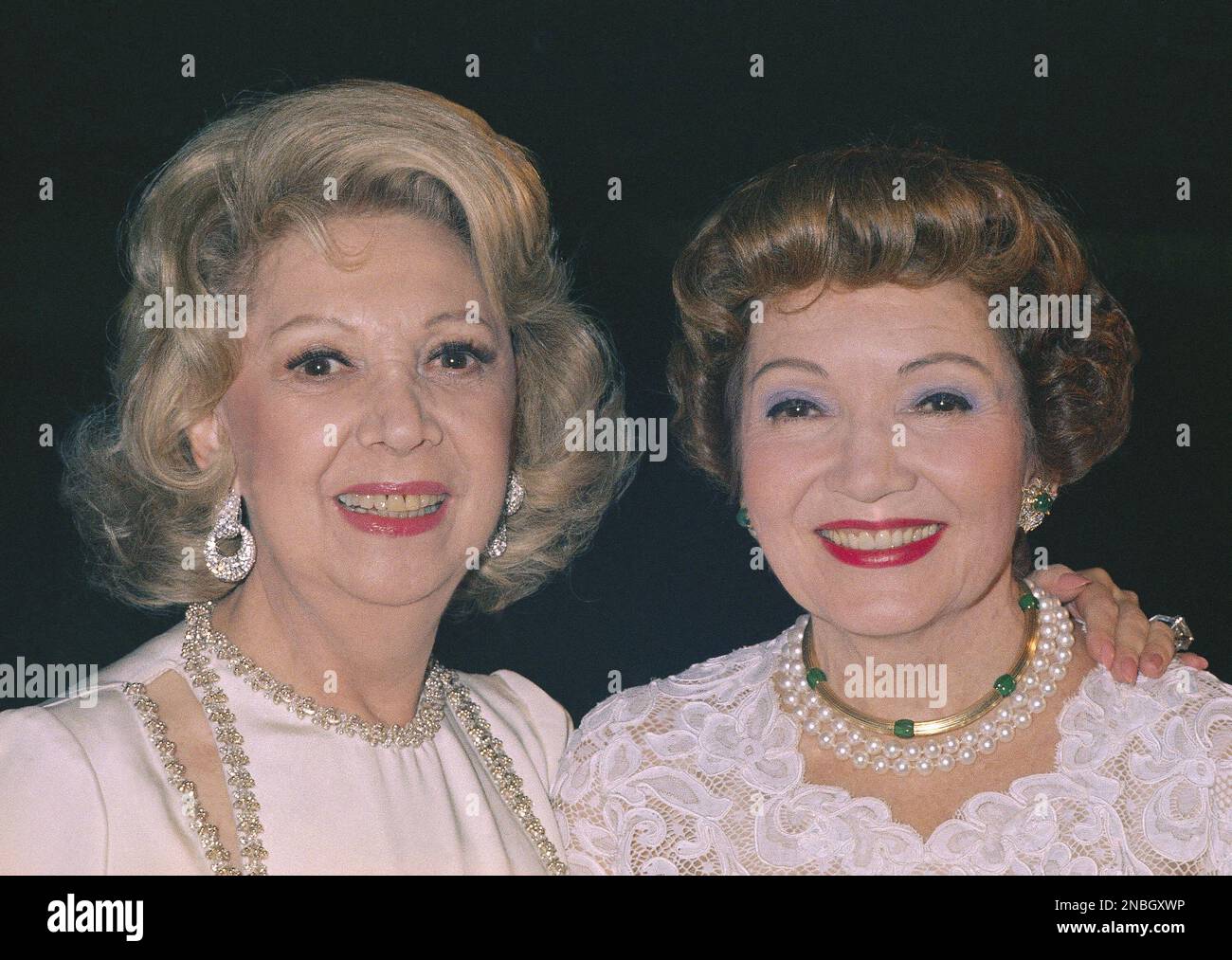 Mary Livingston, left, wife of Jack Benny, and Claudette Colbert, movie ...