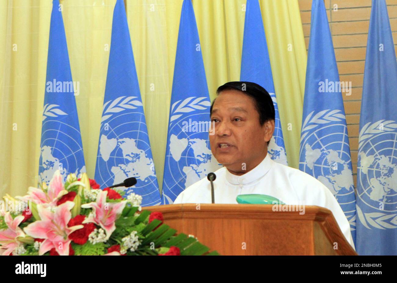Myanmar's Immigration and Population Minister Khin Yi delivers his speech at a ceremony to mark ...