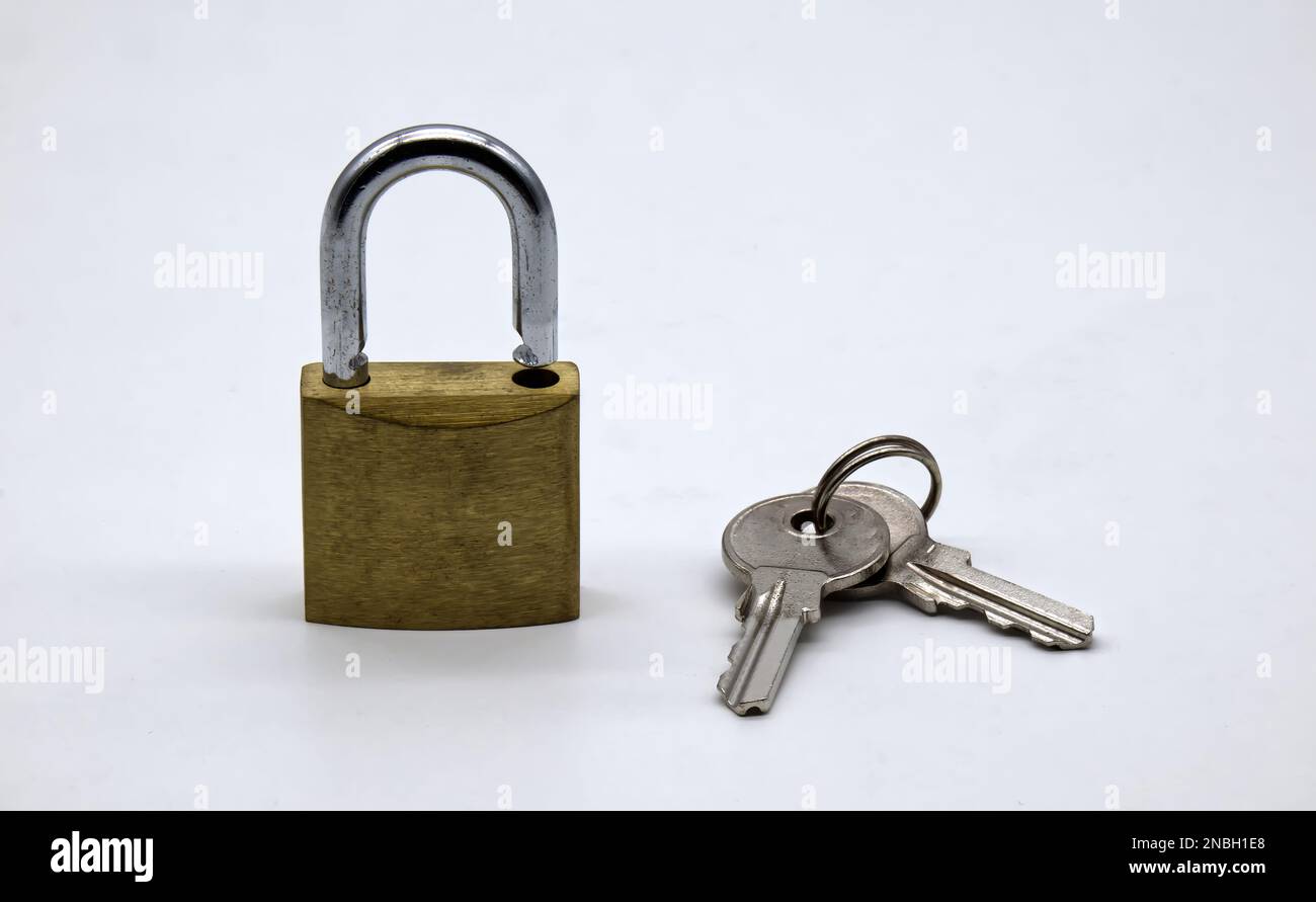 Padlock with keys isolated on white background Stock Photo - Alamy
