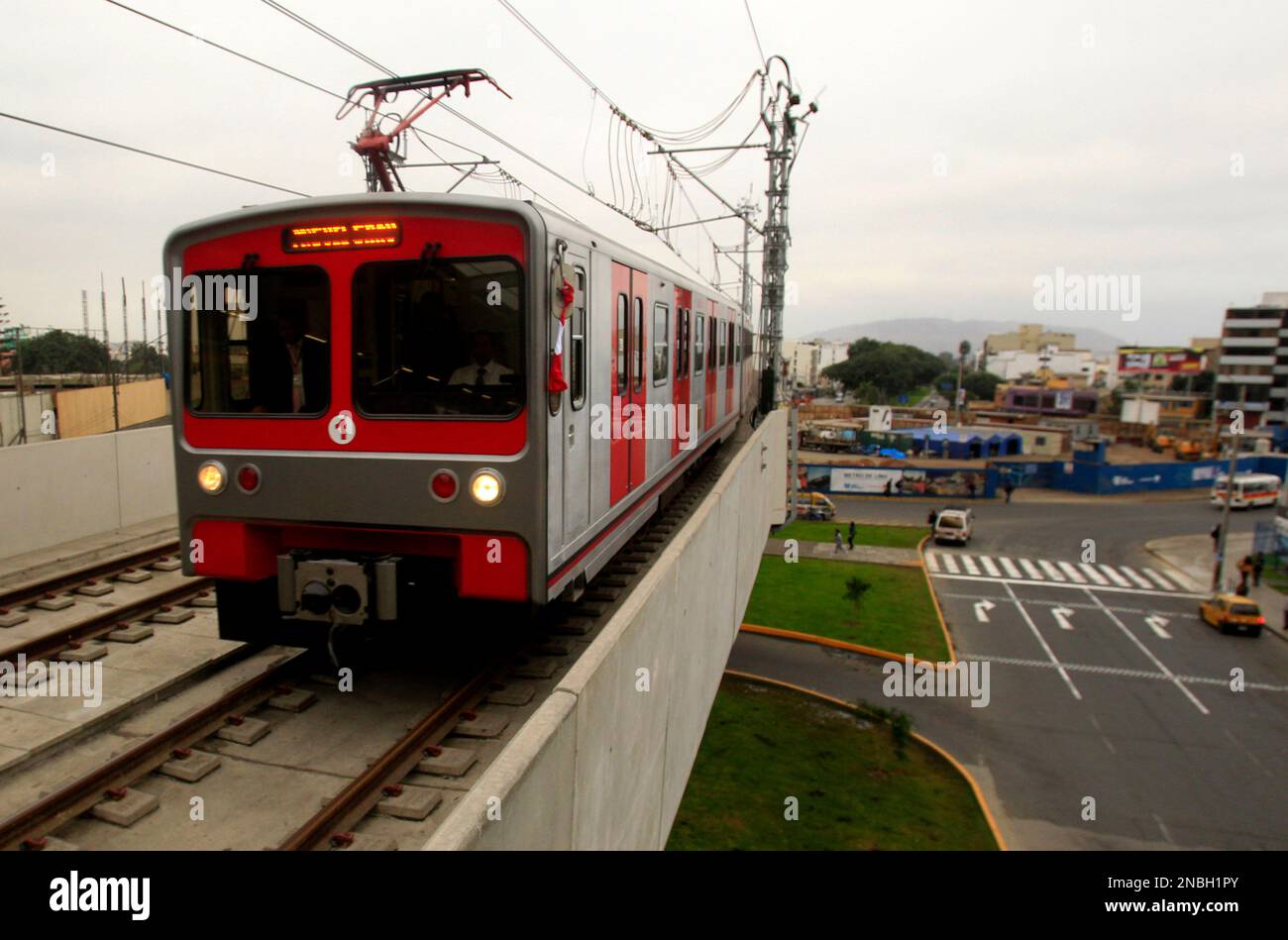 Electric train Line 1 arrives at the rail station before its ...