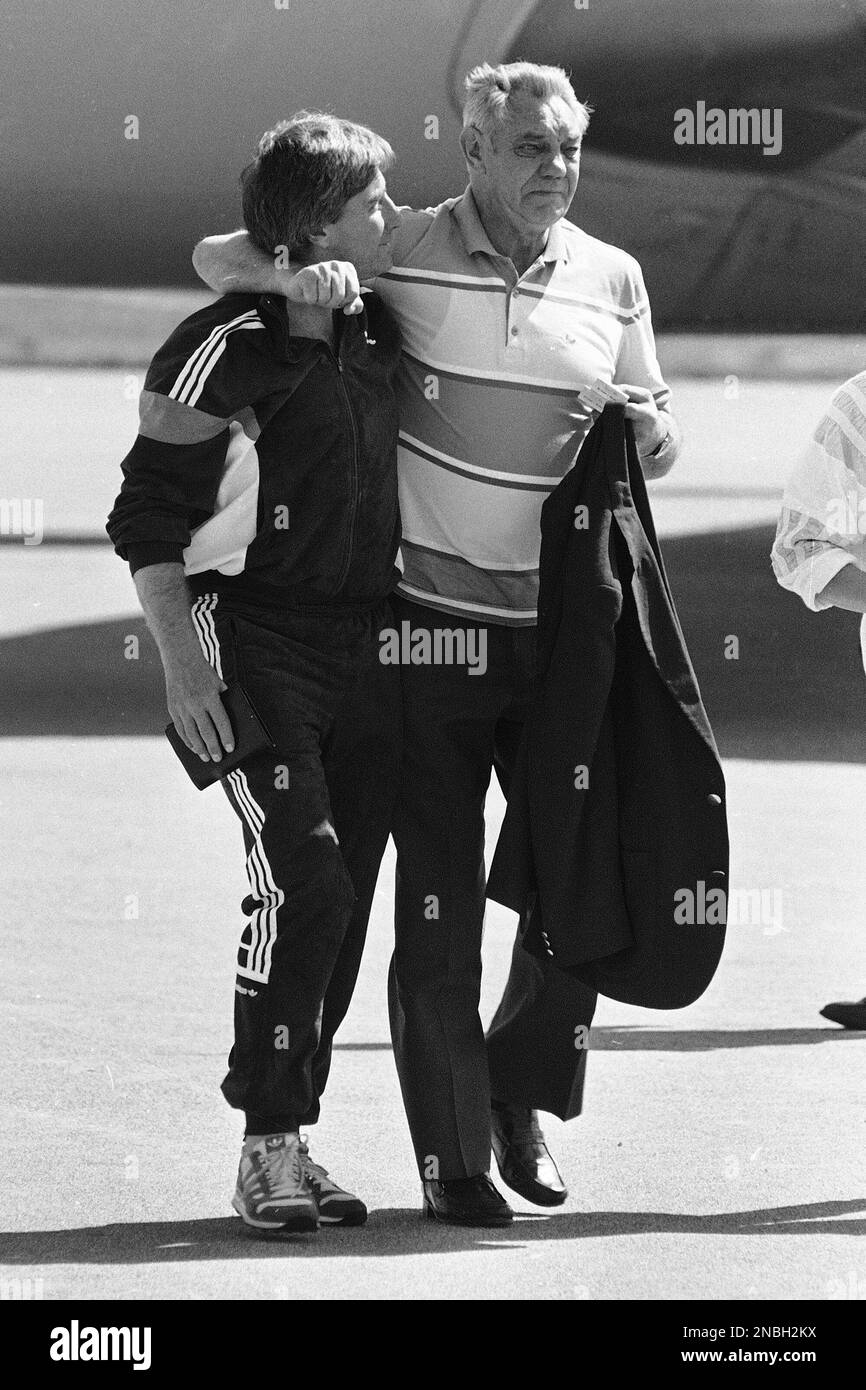Liverpool manager Joe Fagan, right in tears, with his arm on his ...