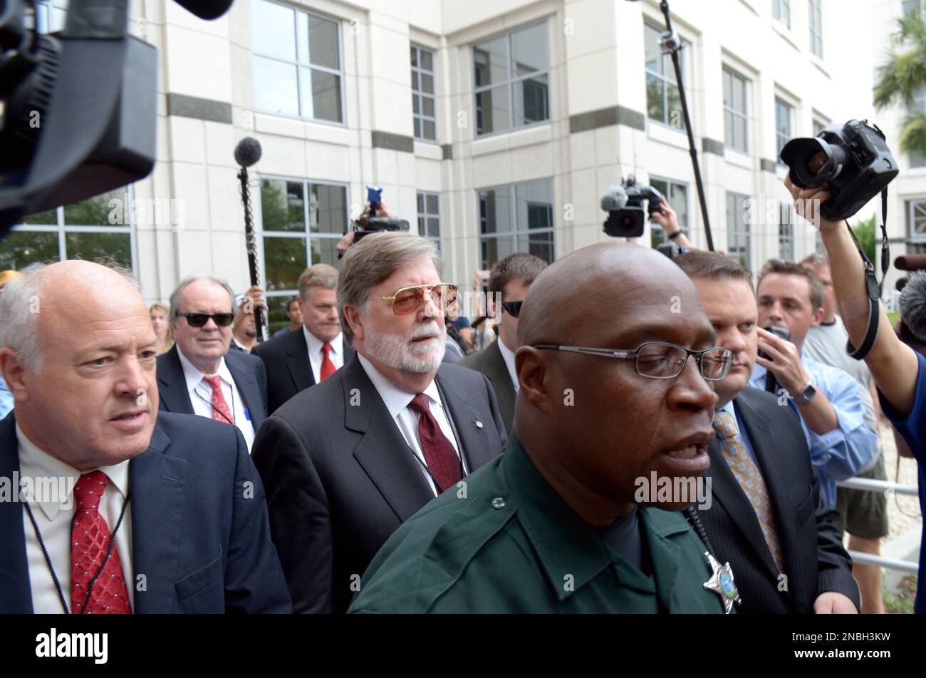 Defense attorney Cheney Mason, center, arrives at the Orange County ...