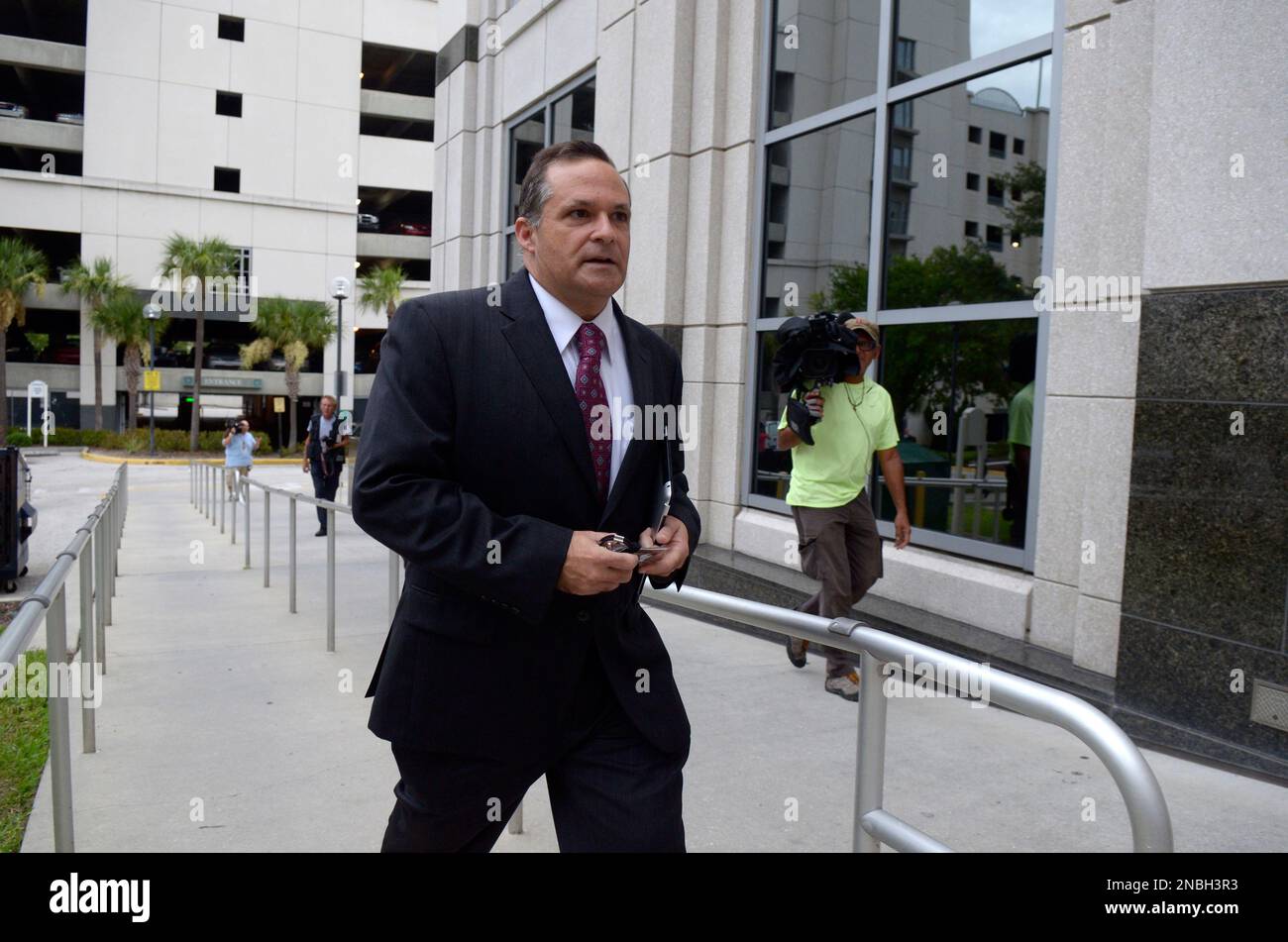 State attorney George Frank arrives at the Orange County Courthouse for ...