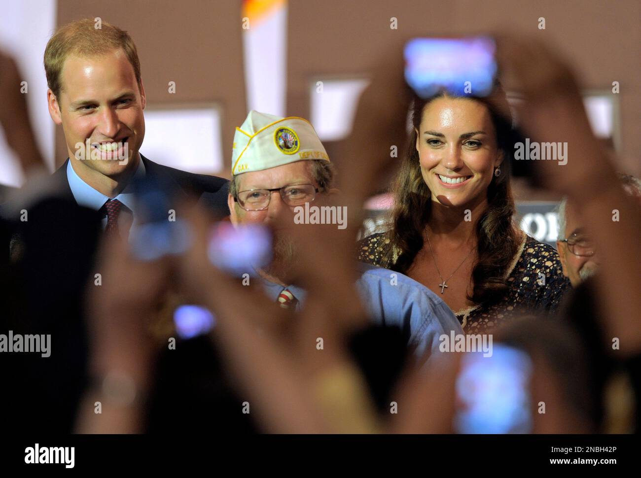 Prince William and Kate, the Duke and Duchess of Cambridge, mingle with ...