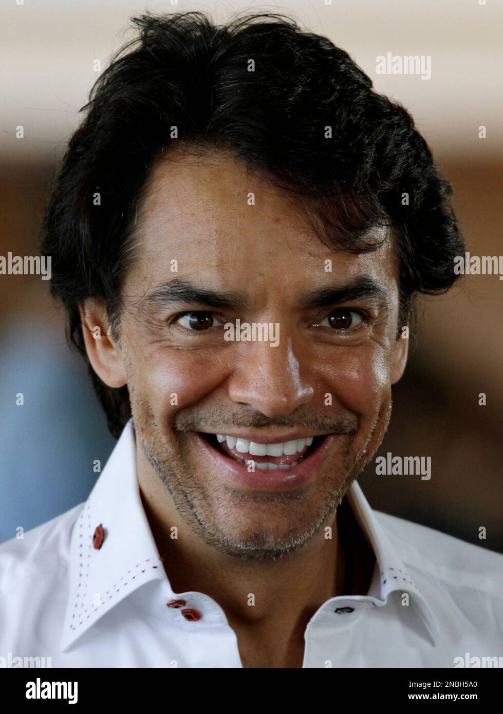Mexican actor Eugenio Derbez poses for photographers during a media ...