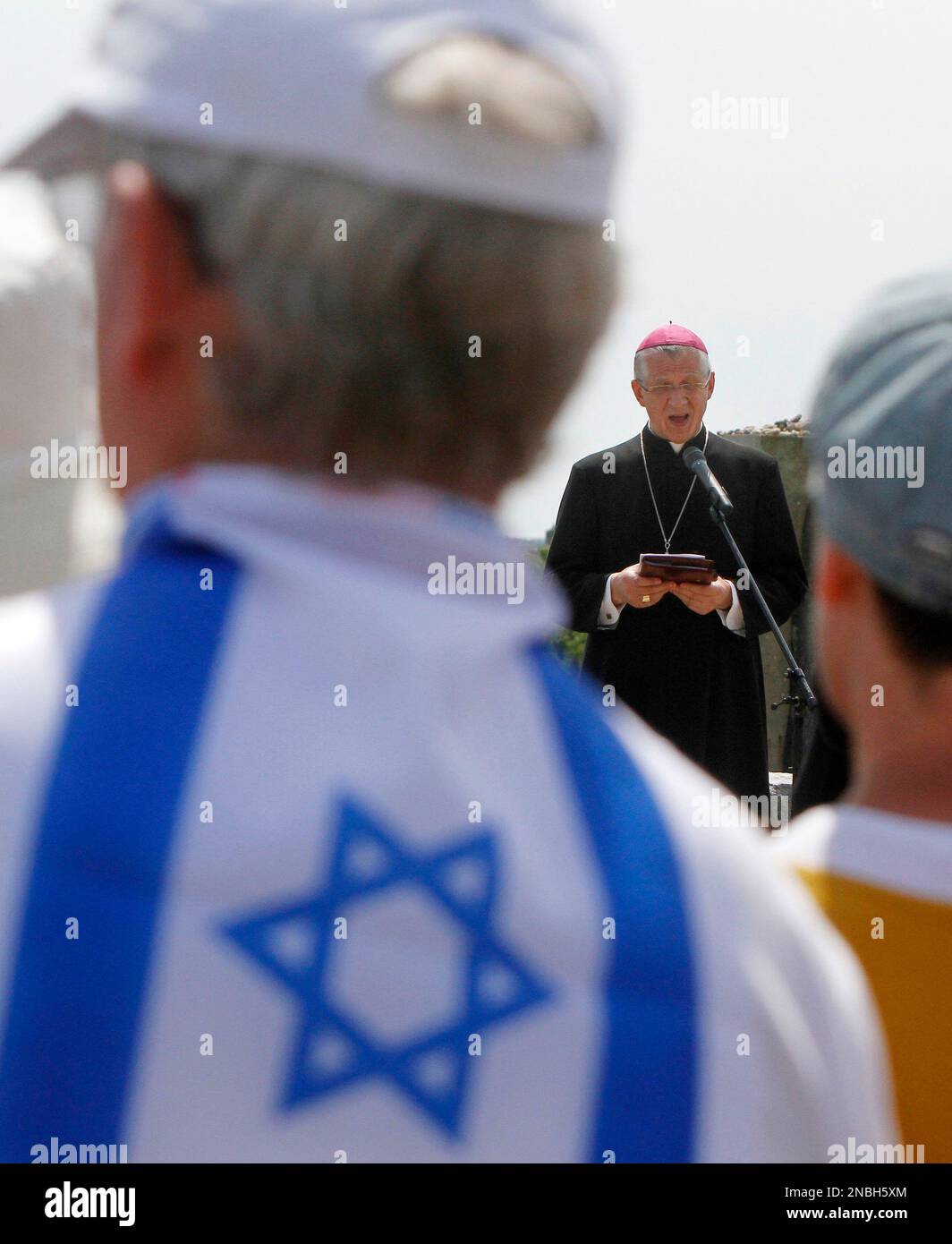 Poland's Roman Catholic Bishop Mieczyslaw Cislo speaks before praying ...