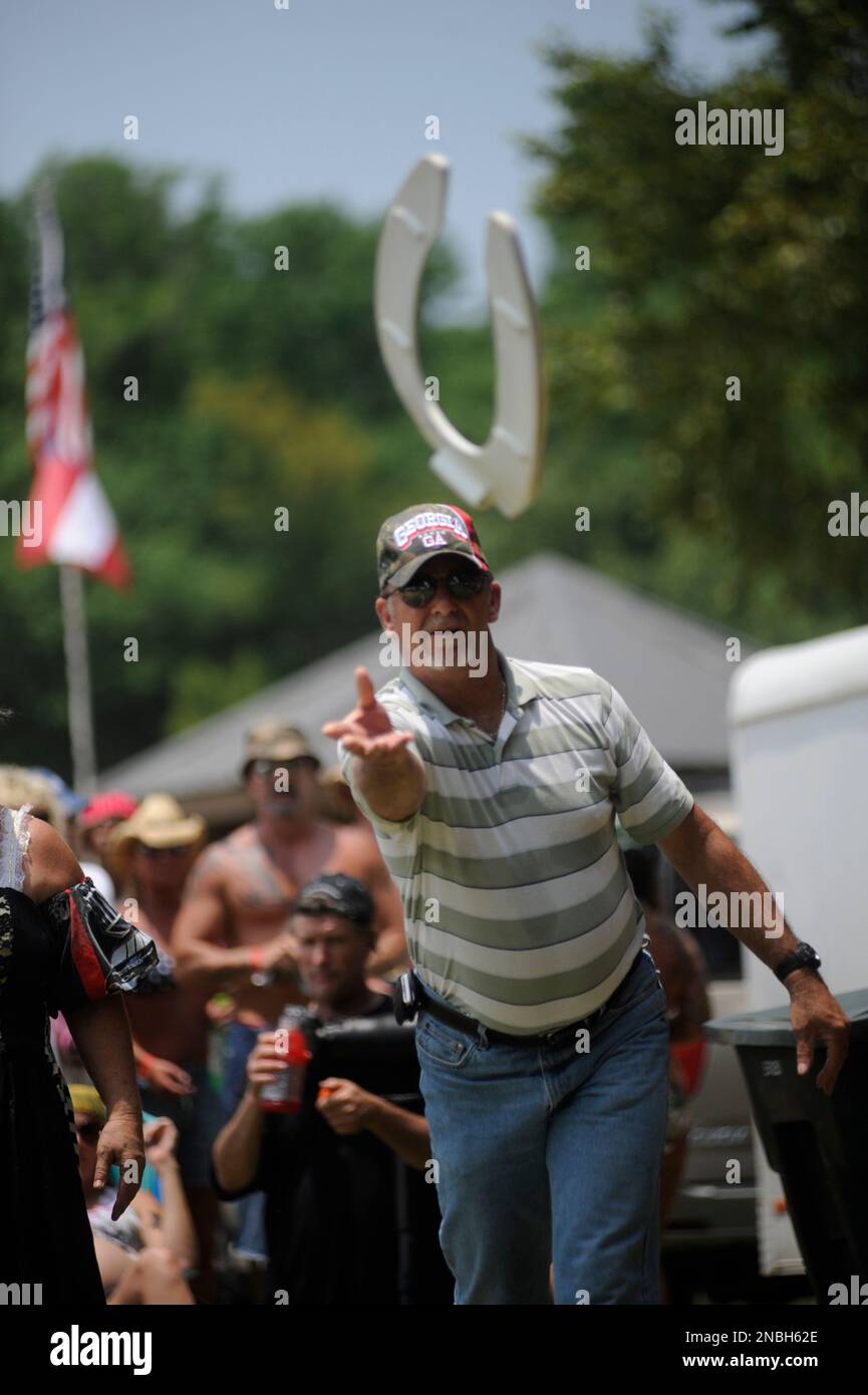 John Weatherby throws toilet seat before the toss competition at the at ...