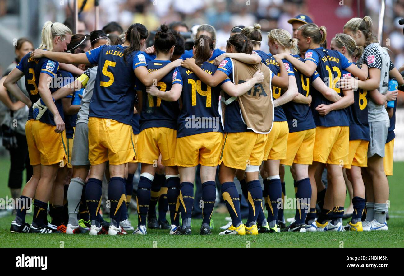 Australian players gather after their team lost 1-3 the quarterfinal ...