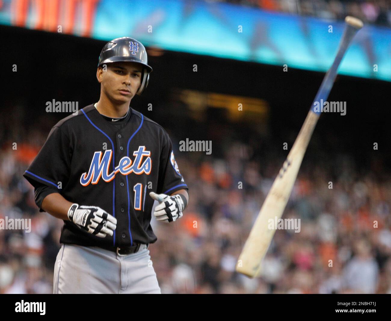 New York Mets' Ruben Tejada tosses his bat after striking out against ...