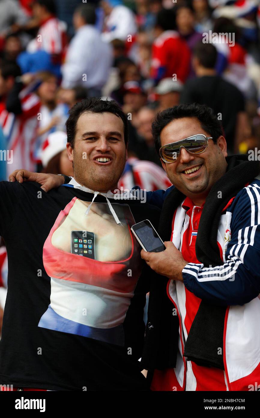 Paraguayan fans pose for pictures before the start of a Group B Copa ...