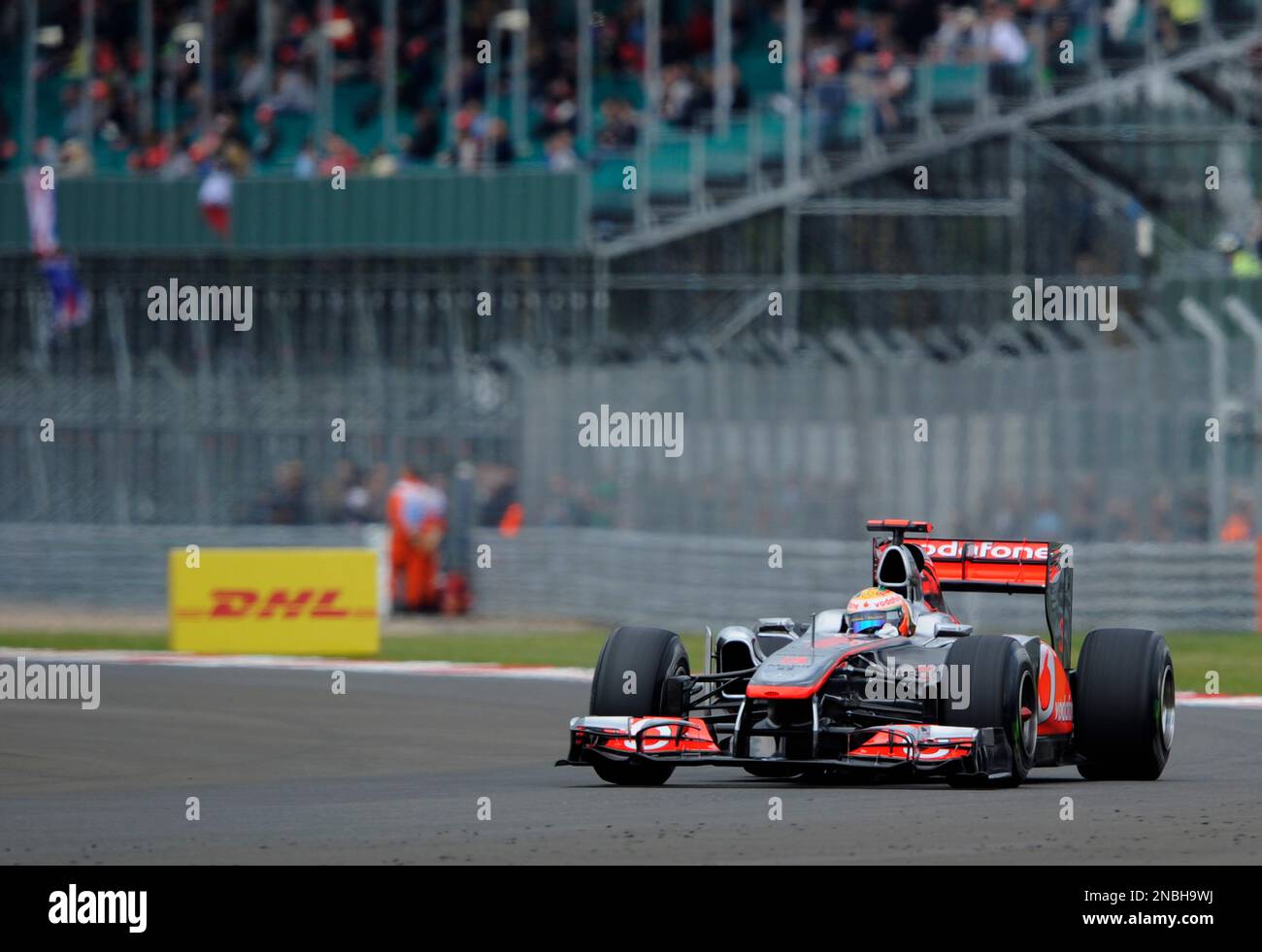 Britain's McLaren Formula 1 driver Lewis Hamilton drives into Copse ...