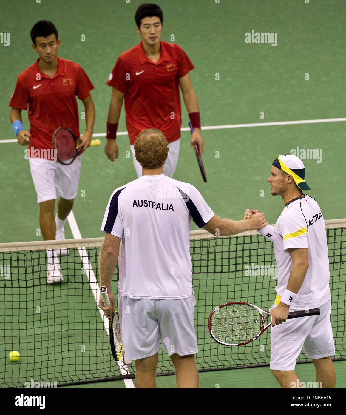 Australia's Lleyton Hewitt, foreground right, celebrates with teammate ...