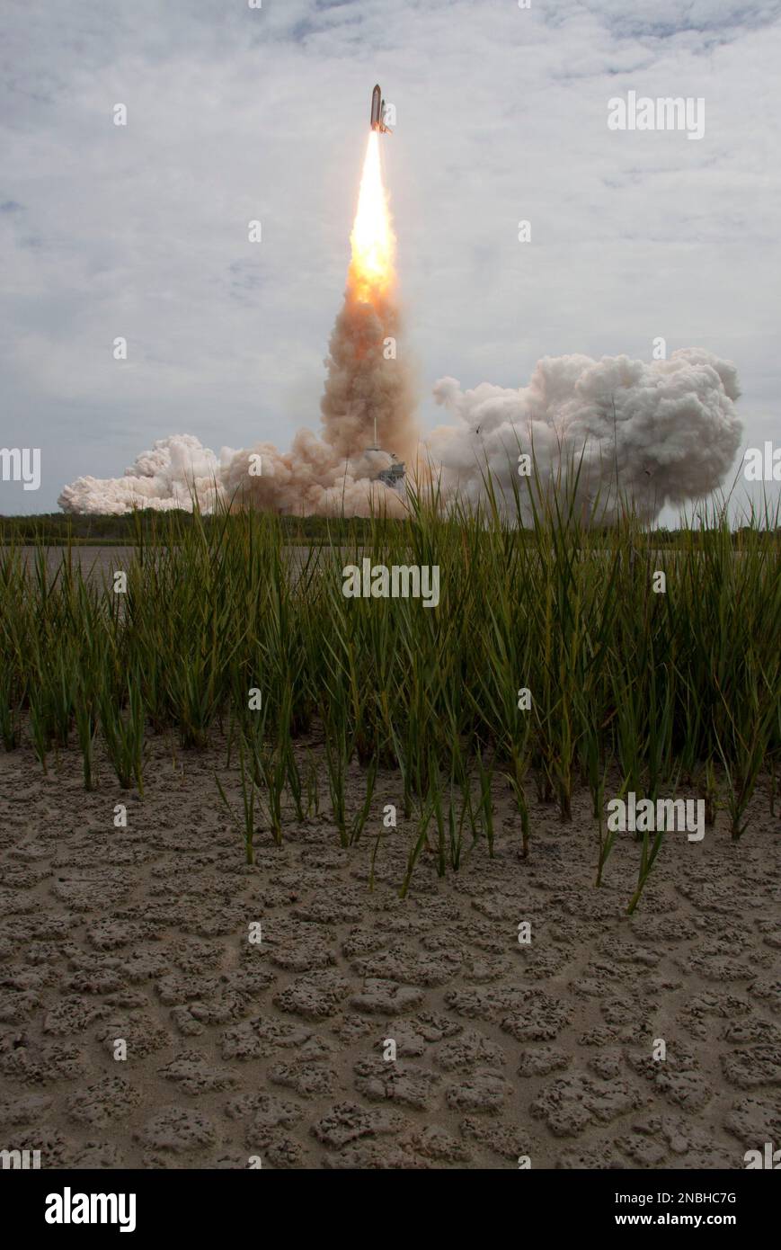 The space shuttle Atlantis lifts off from the Kennedy Space Center ...
