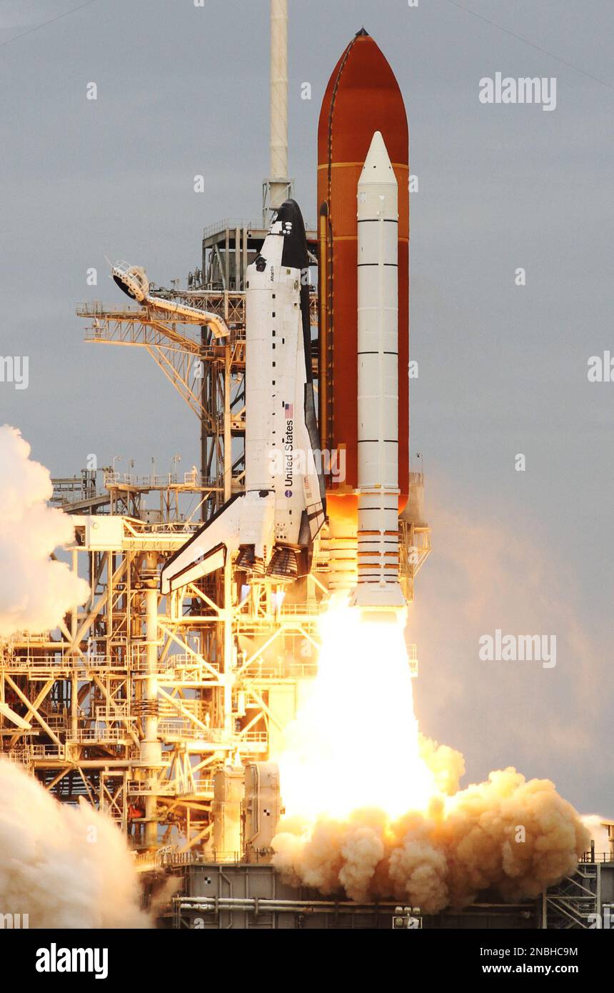 The space shuttle Atlantis lifts off from the Kennedy Space Center ...