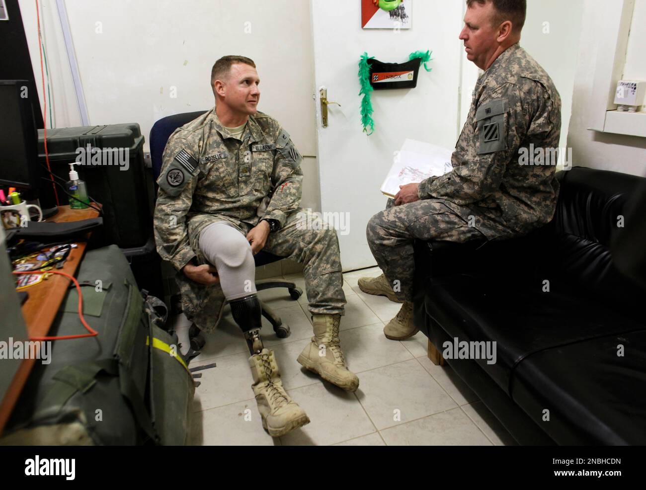 U.S. Army Maj. David Rozelle, left, Executive Officer for 5th Squadron ...