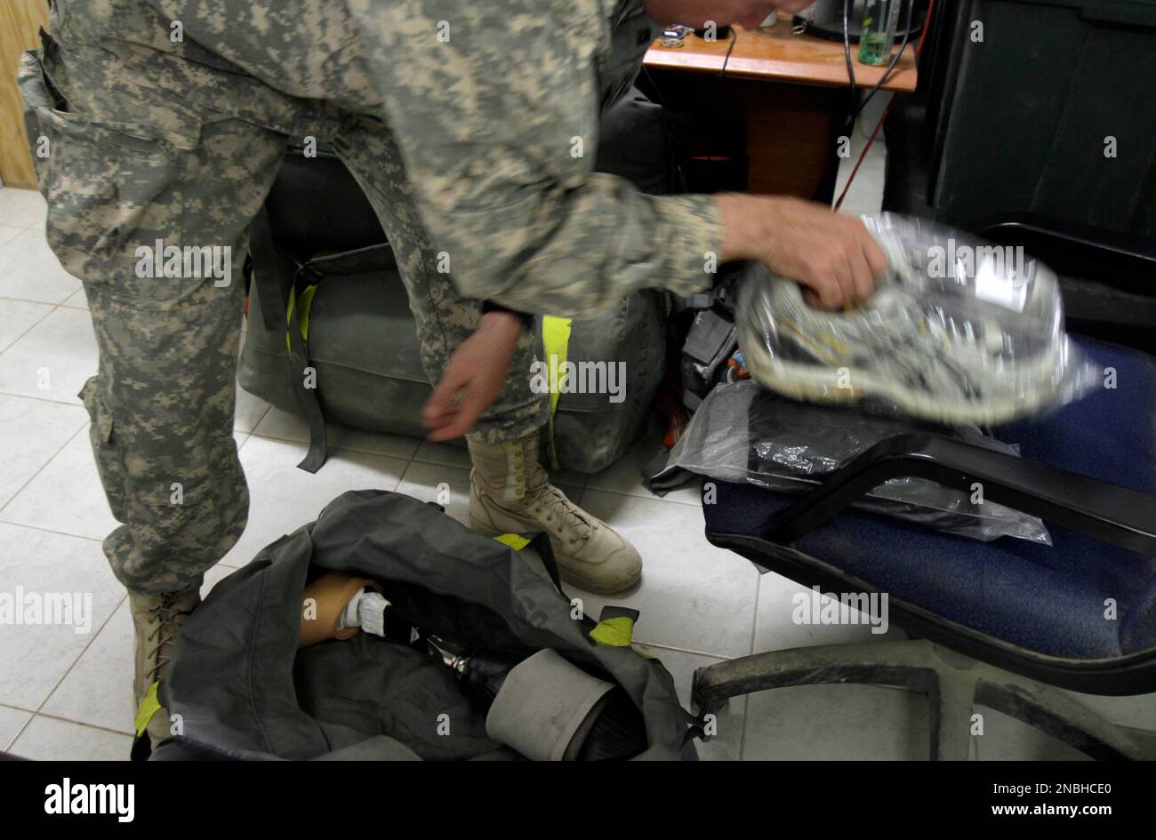 U.S. Army Maj. David Rozelle, left, Executive Officer for 5th Squadron ...