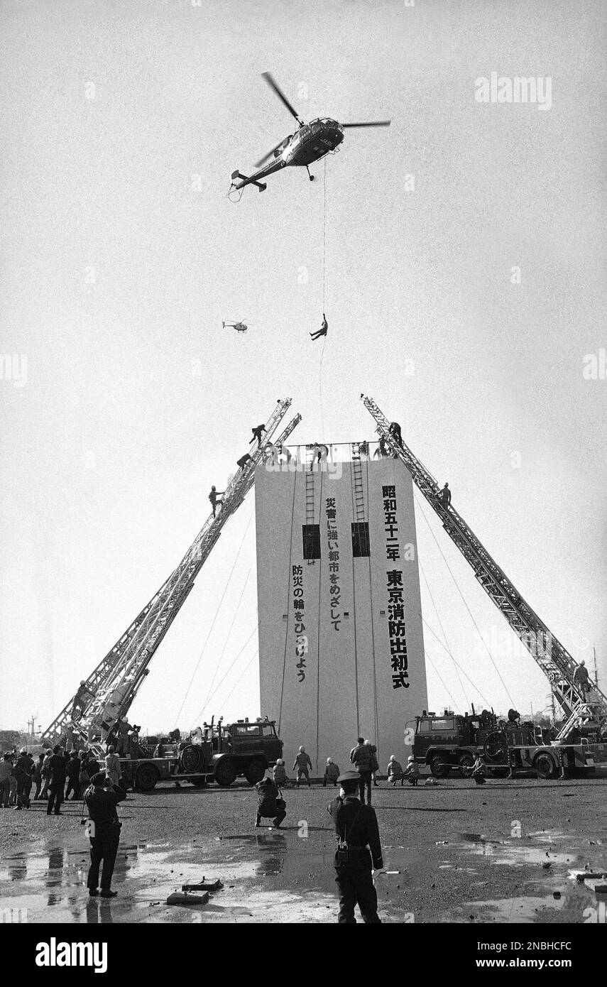Firemen of the Tokyo metropolitan fire department perform a rescue ...