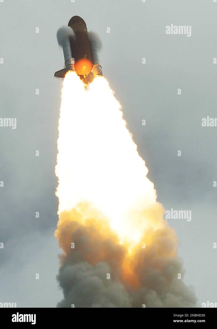 The space shuttle Atlantis lifts off from the Kennedy Space Center ...
