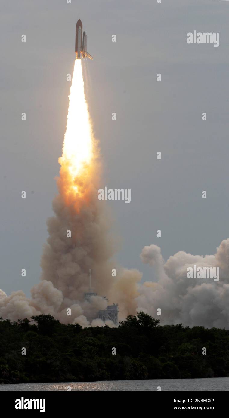 The space shuttle Atlantis lifts off from the Kennedy Space Center ...