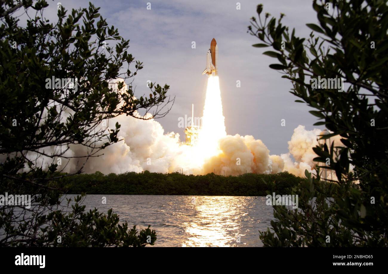 The space shuttle Atlantis lifts off from the Kennedy Space Center ...