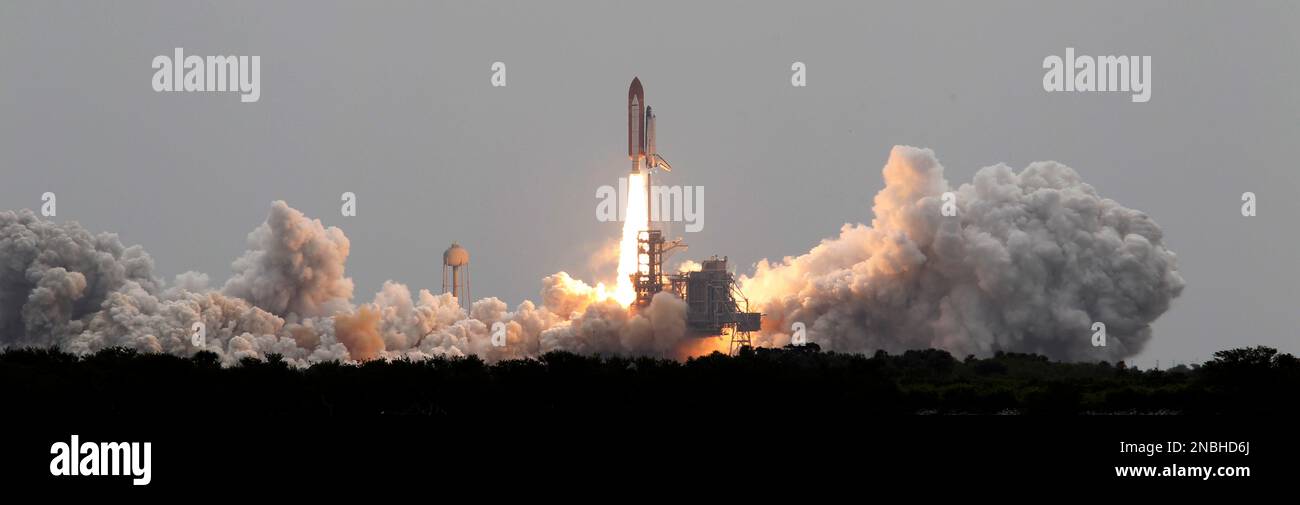 The space shuttle Atlantis lifts off from the Kennedy Space Center ...