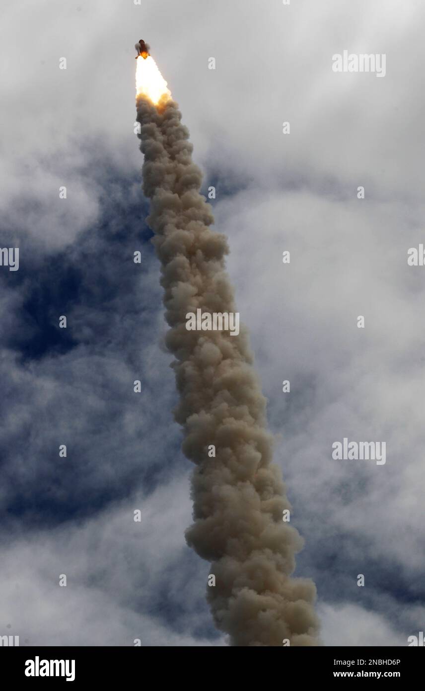The space shuttle Atlantis lifts off from the Kennedy Space Center ...