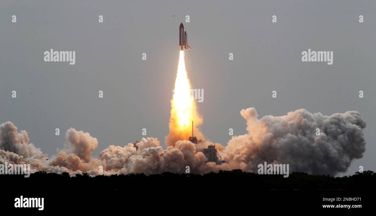 The space shuttle Atlantis lifts off from the Kennedy Space Center ...