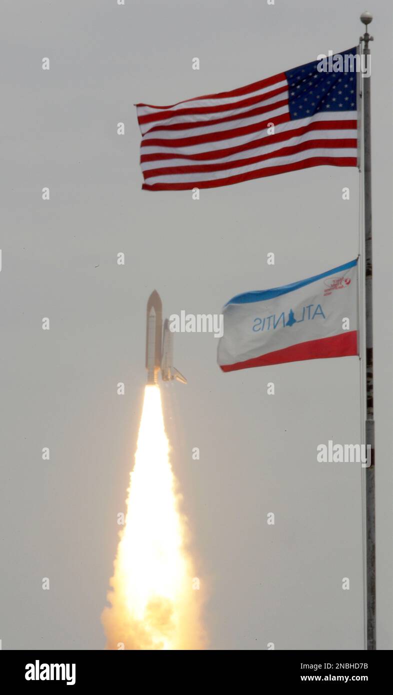 The space shuttle Atlantis lifts off from the Kennedy Space Center ...
