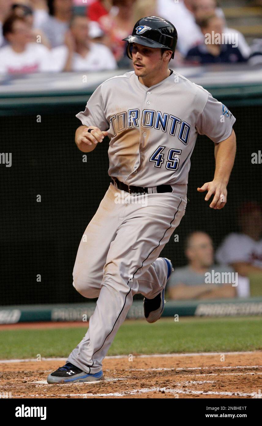 Toronto Blue Jays' Travis Snider scores against the Cleveland Indians ...