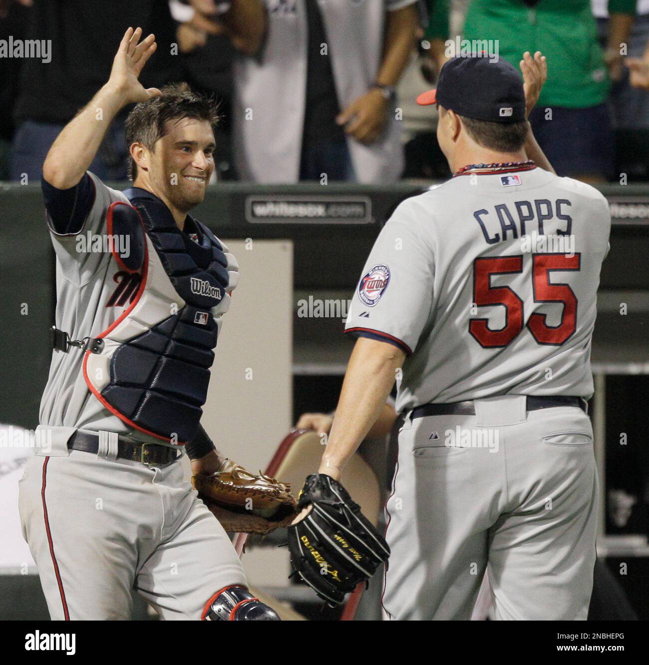 Minnesota Twins catcher Drew Butera, left, celebrates with closer Matt ...