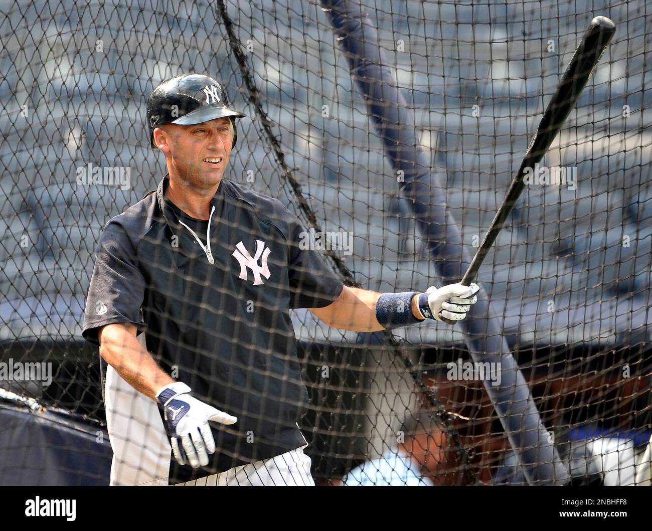 New York Yankees' Derek Jeter takes batting practice before the Yankees ...