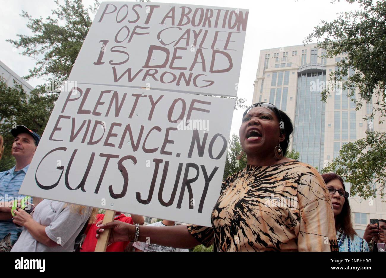 Flora Reece protests outside the Orange County Courthouse in Orlando ...