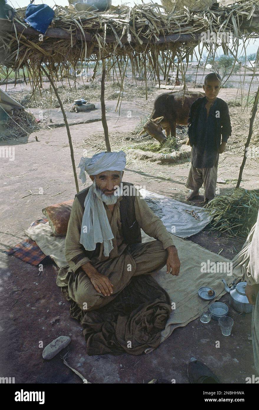 Afghan refugees are shown in a camp on Kohat Road outside of Peshawar ...