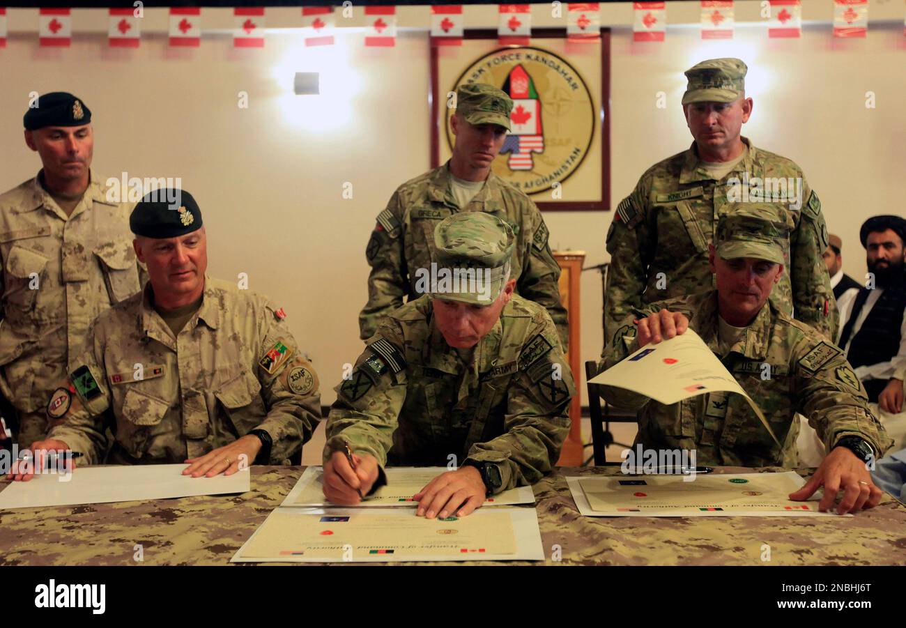 U.S Major General James L.Terry center, Commander Regional Command ...