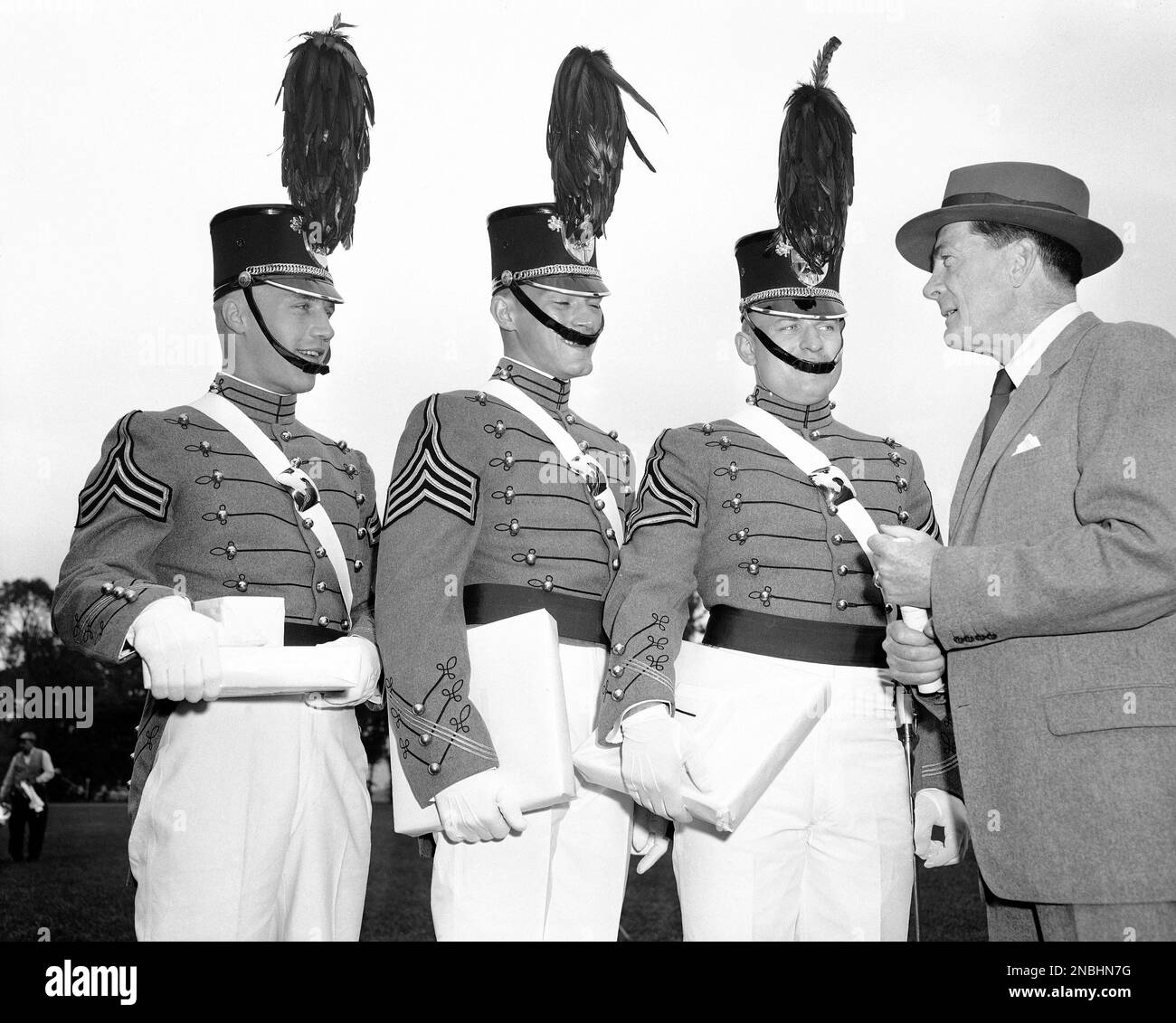 Army Football Coach Earl (Red) Blaik, right, talks with three members ...