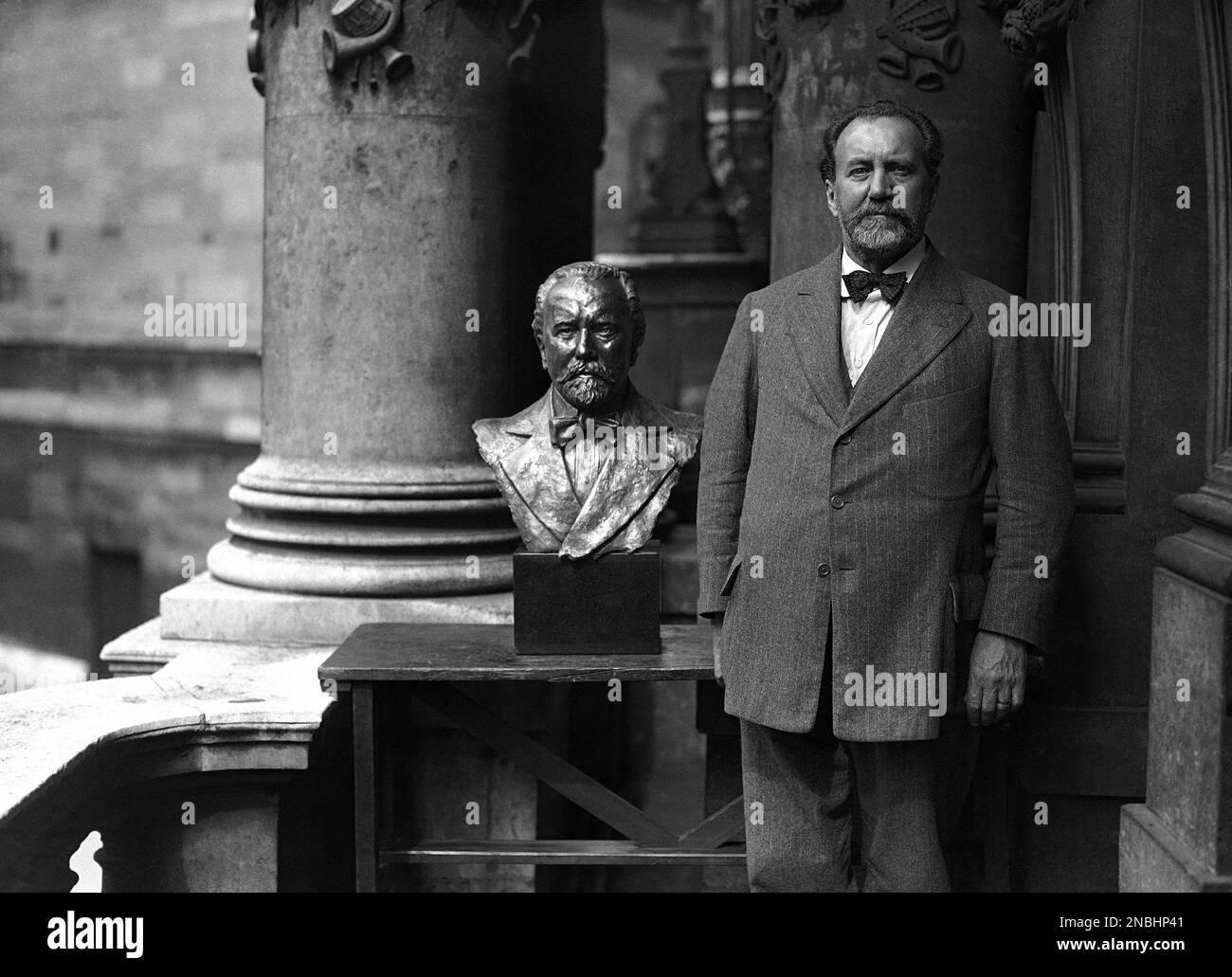 Sir Henry Wood, the great conductor inspecting the bust of himself at ...