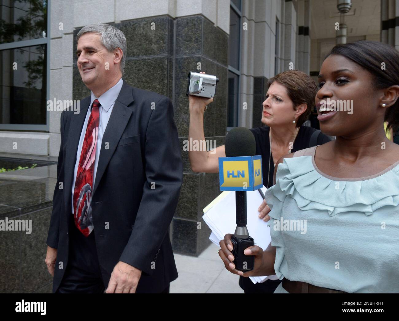 Prosecutor Jeff Ashton, left, arrives at the Orange County Courthouse ...