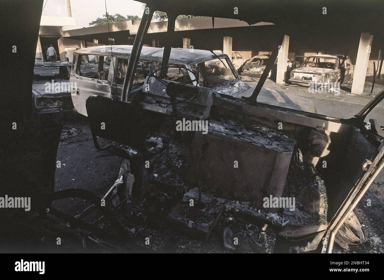 View of burned out building and burned cars in Islamabad, Pakistan, Nov ...