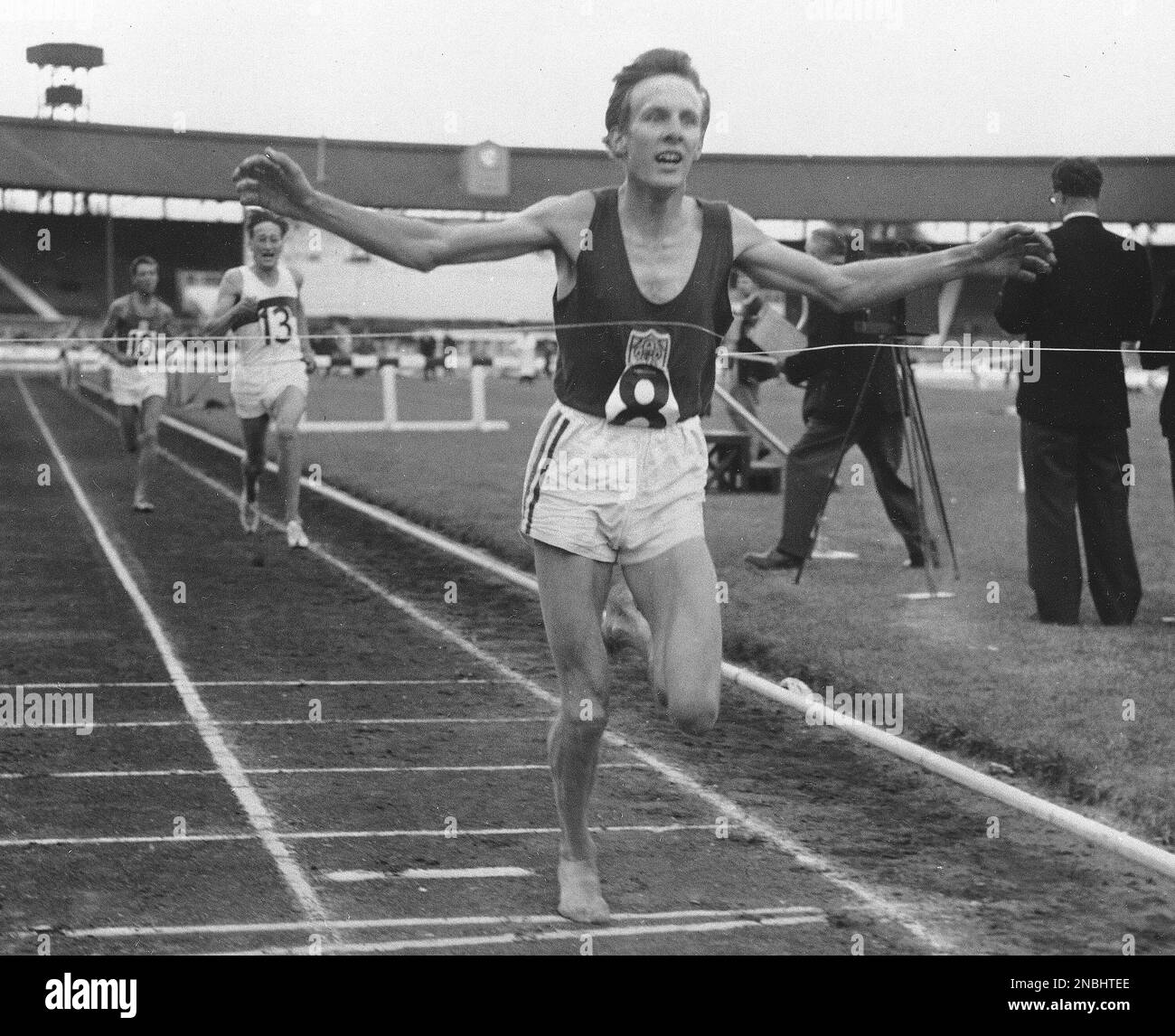 Bruce Tulloh, 24, a 112-pound botanist, wins the six-mile run in ...